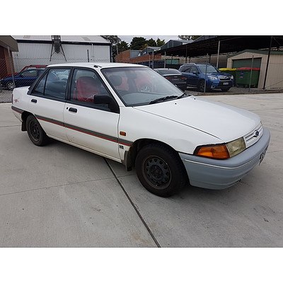 4/1991 Ford Laser GL KF 4d Sedan - Lot 927258 | CARBIDS