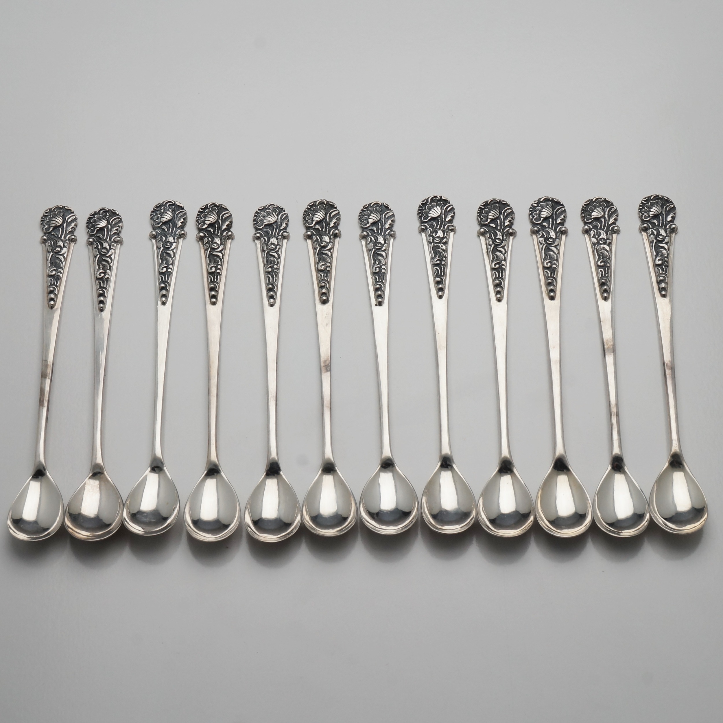 Twelve Yogya Silver Cocktail Spoons - Lot 1016972 | ALLBIDS