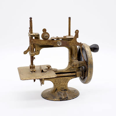 Peter Pan Child's Cast Metal Sewing - Lot 1002805 | ALLBIDS