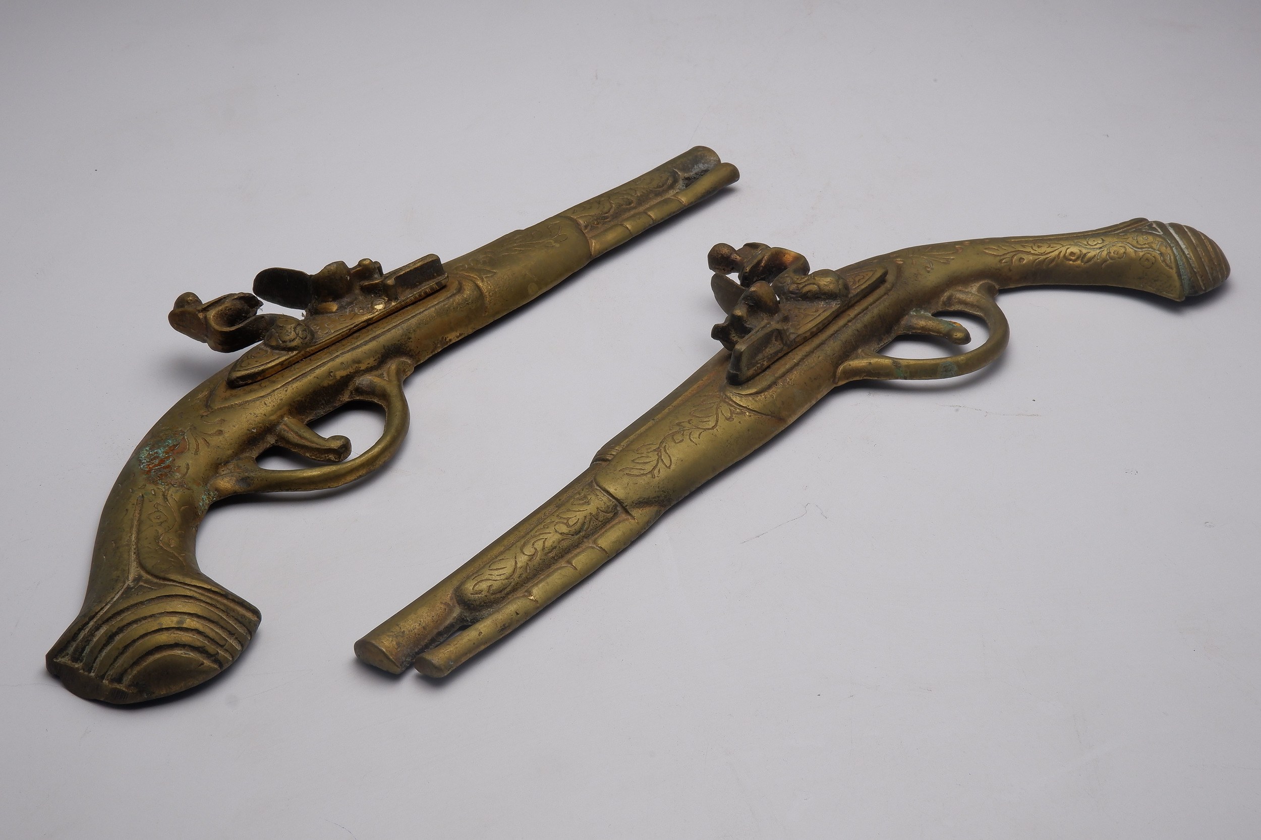 Two Vintage Brass Ornamental Gun - Lot 1099996 | ALLBIDS