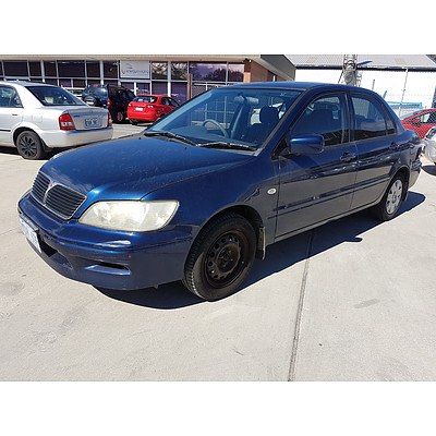 1/2003 Mitsubishi Lancer LS 4d - Lot 1066214 | CARBIDS