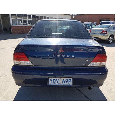 1/2003 Mitsubishi Lancer LS 4d - Lot 1066214 | CARBIDS